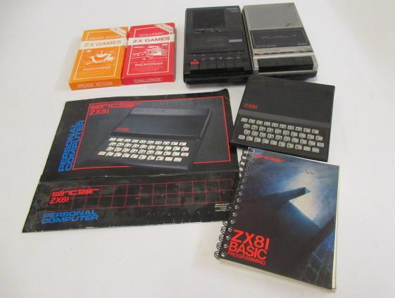 A sinclair zx81 computer with cassette recorder and programming books ...