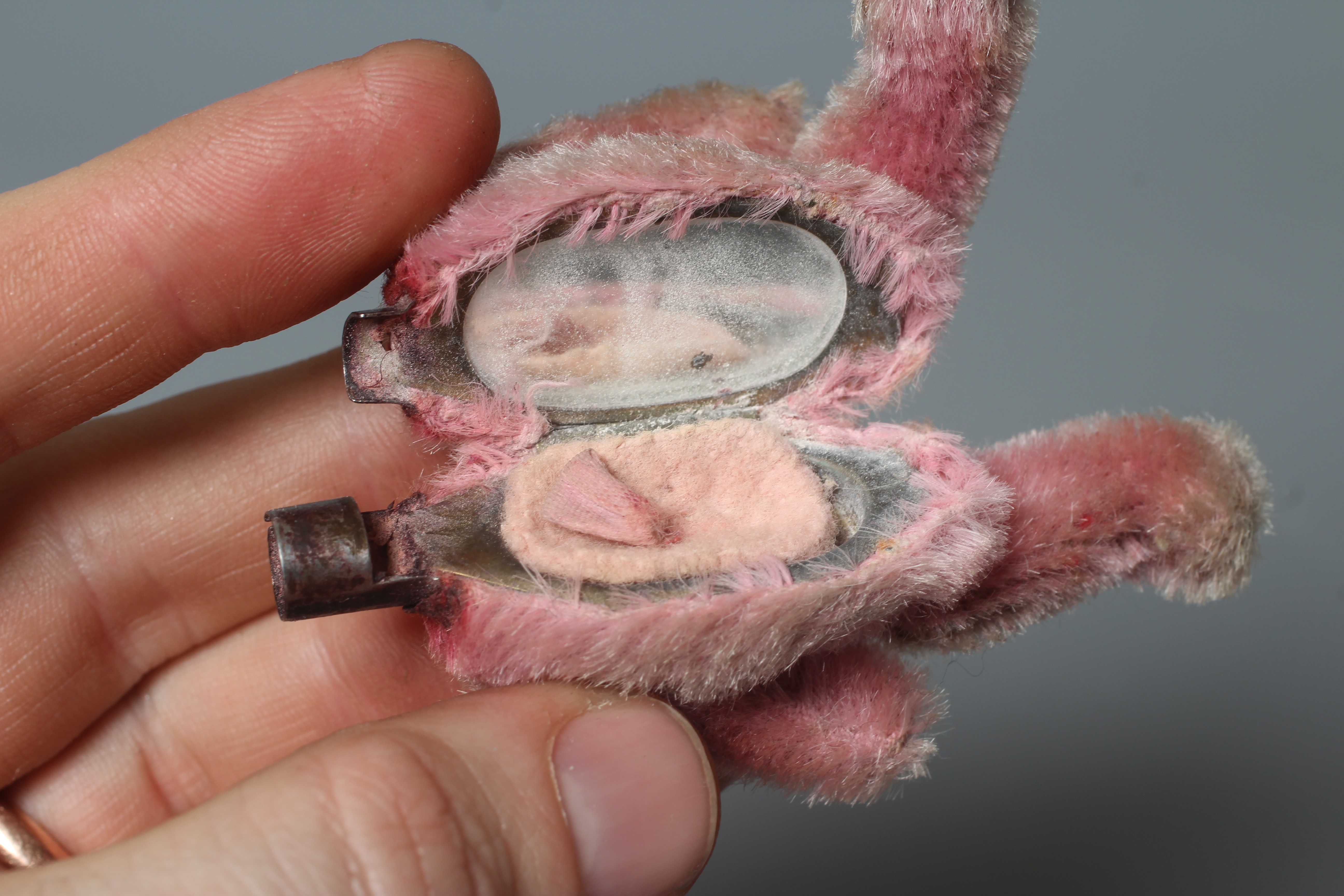 A rare schuco pink teddy bear compact, with neck ruff and powder puff ...
