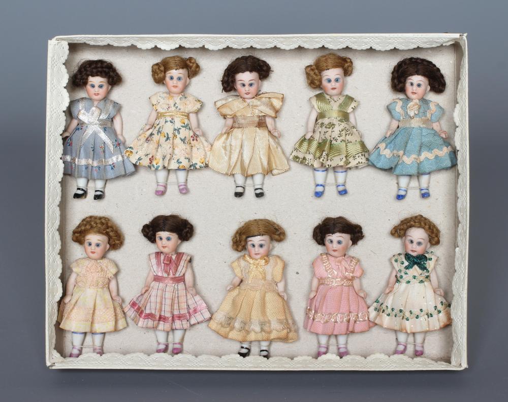 A boxed set of ten all bisque miniature dolls | Hartleys Auctioneers ...