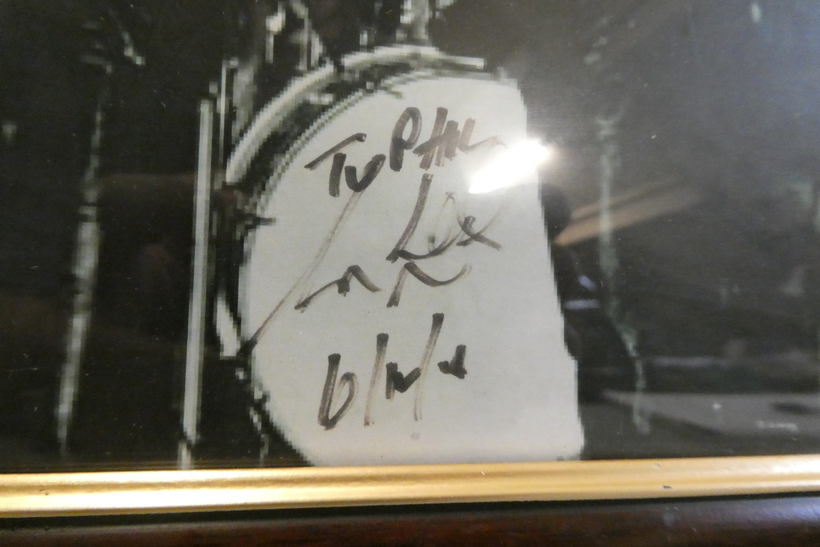 Two photographs signed by sam leach, photographed with members of the ...