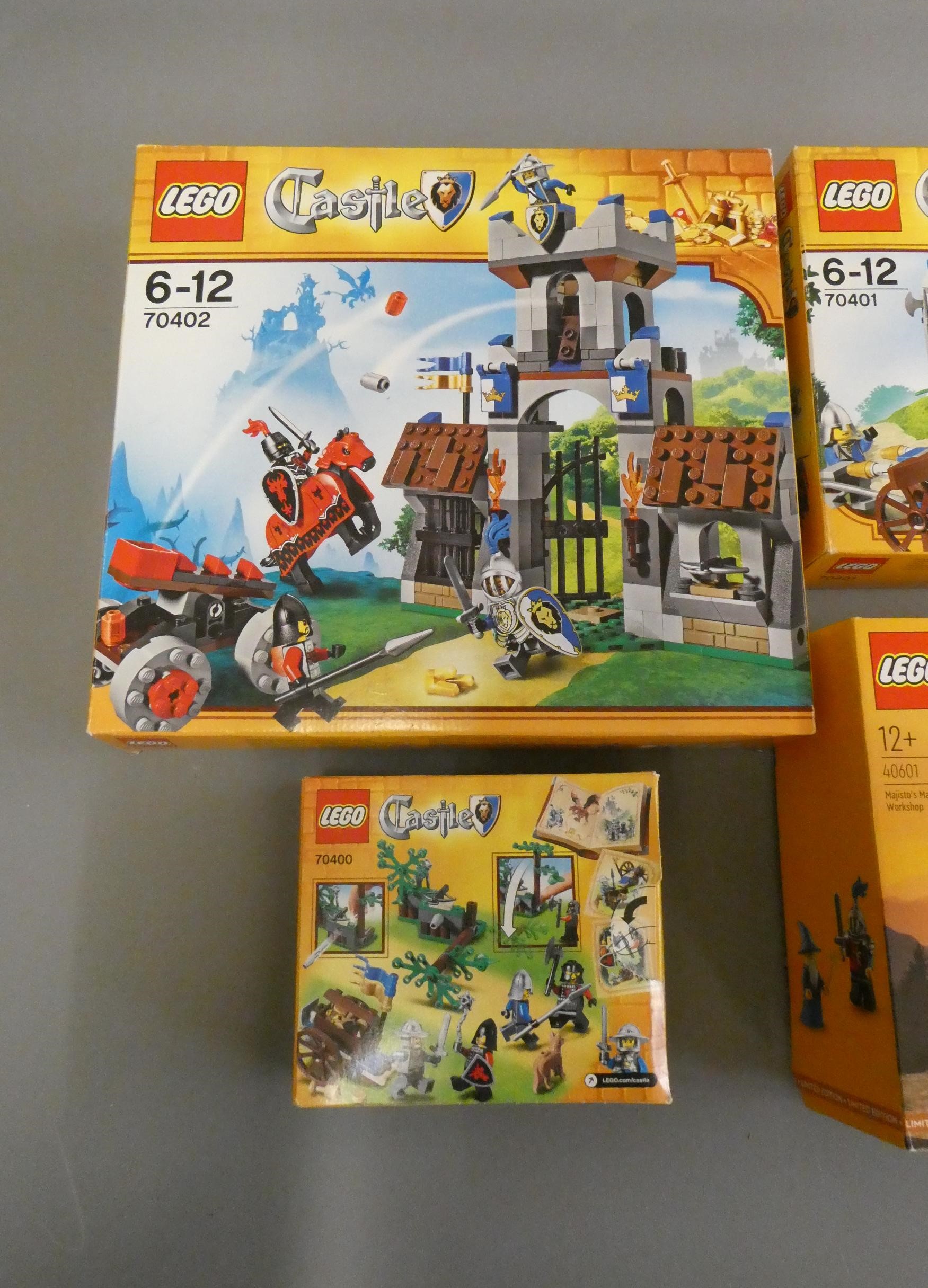 Five boxed lego sets including castle 3835/40601/70400/70401/70402 and ...