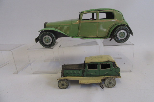 A mettoy tinplate clockwork saloon car | Hartleys Auctioneers & Valuers