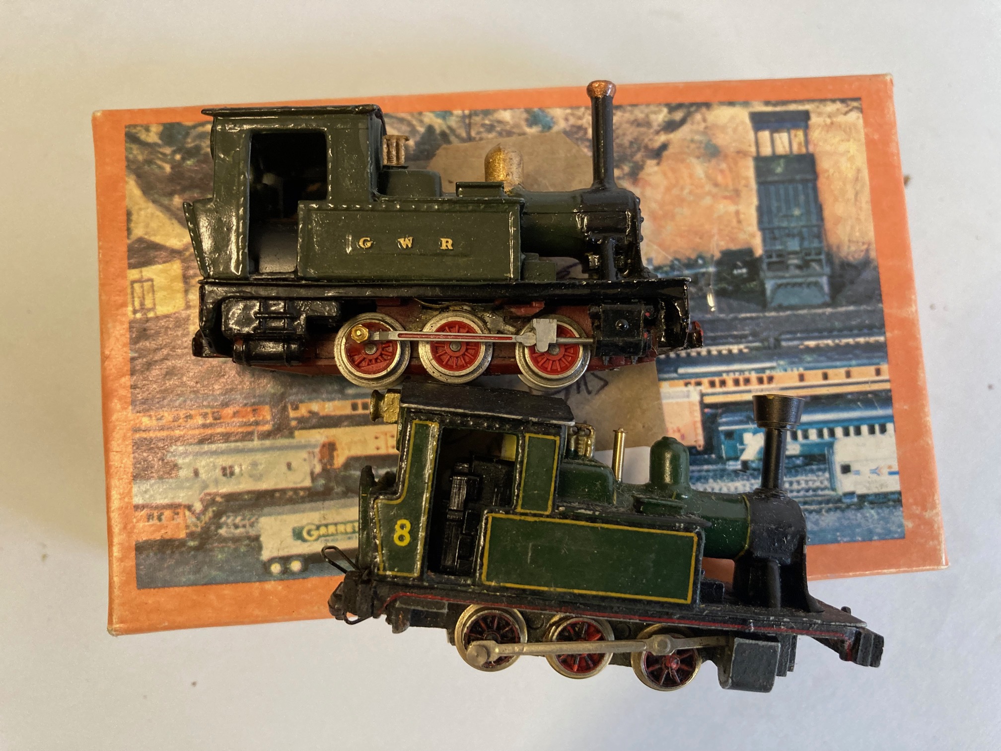 Two 009 narrow gauge kit built 0-6-0 tank locomotives finished in g.w.r ...