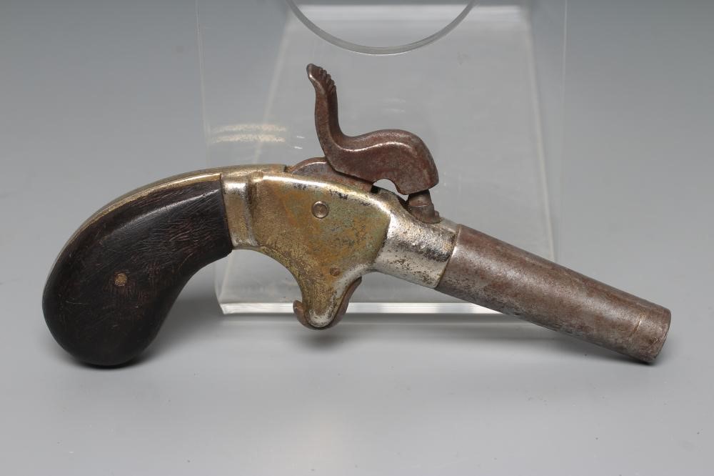 A percussion derringer with 2" screw off barrel, sheathed trigger, two ...