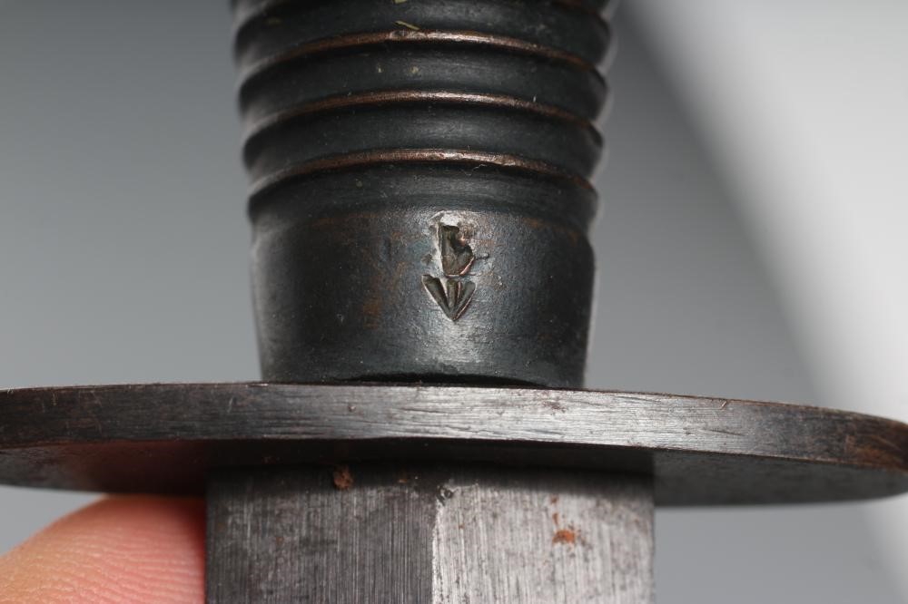 A fairbairn & sykes type dagger with 7" blade, brass crossguard, brass ...