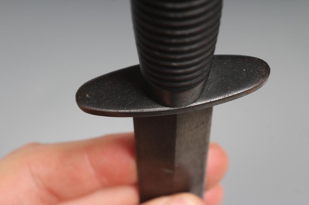 A fairbairn & sykes type dagger with 7" blade, brass crossguard, brass ...