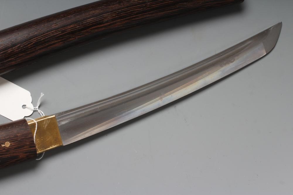 A japanese wakizashi with 11 3/8" fullered and curved blade, highly ...