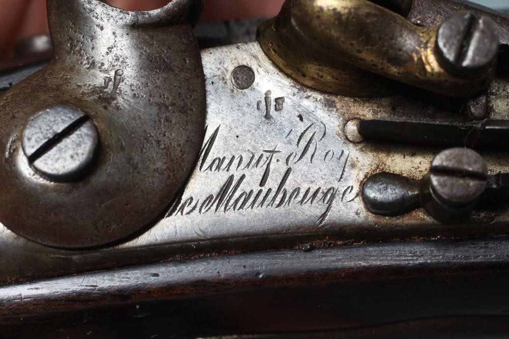 A french manuf flintlock pistol, with 5" barrel stamped 1818, action ...