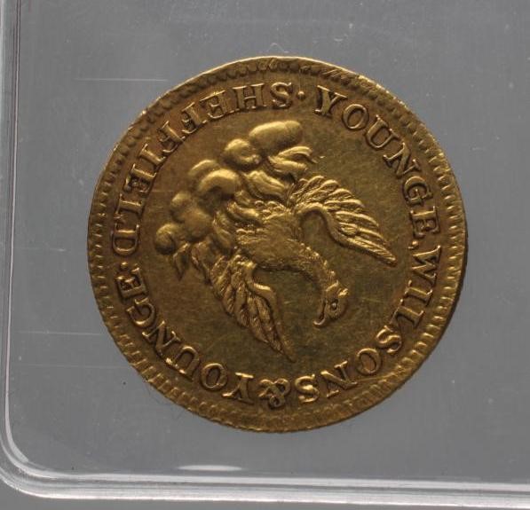 A george iii gold half guinea token | Hartleys Auctioneers & Valuers
