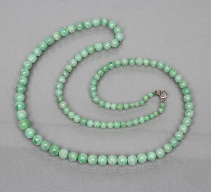 A string of polished graduating jade beads | Hartleys Auctioneers & Valuers