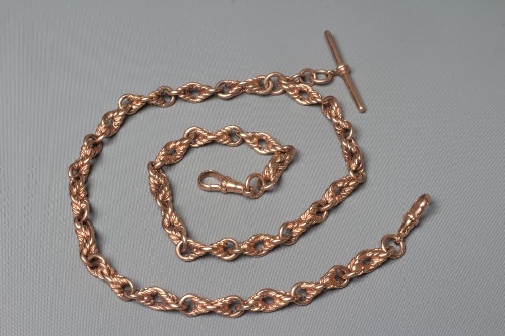 A fancy link double albert chain with two dog-clip fasteners and t bar ...