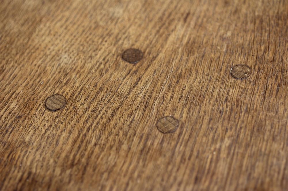 A robert thompson adzed oak dining table | Hartleys Auctioneers & Valuers