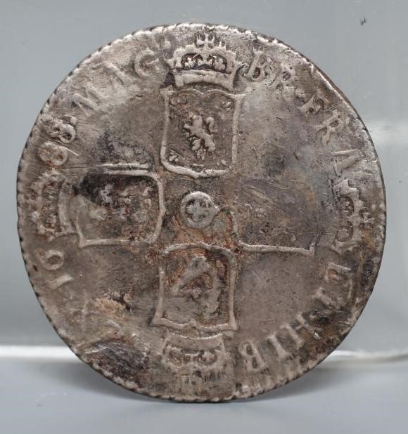 Three james ii silver coins, comprising a 1688 crown with crown ...