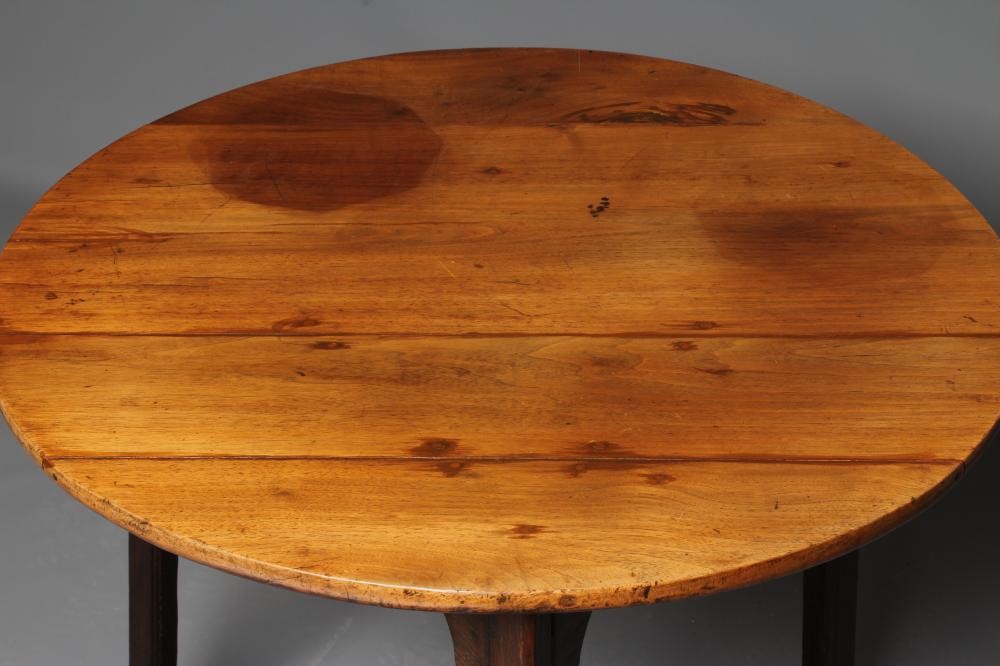 A cricket table, 19th century and later, the fruitwood top and waved ...