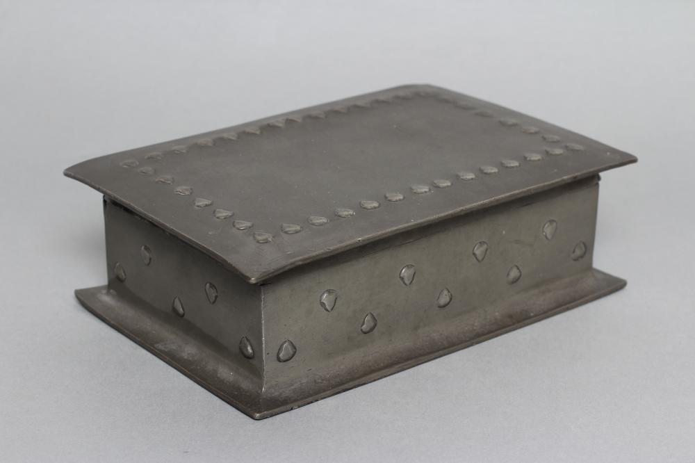 A tudric pewter cigarette box designed by archibald knox | Hartleys ...
