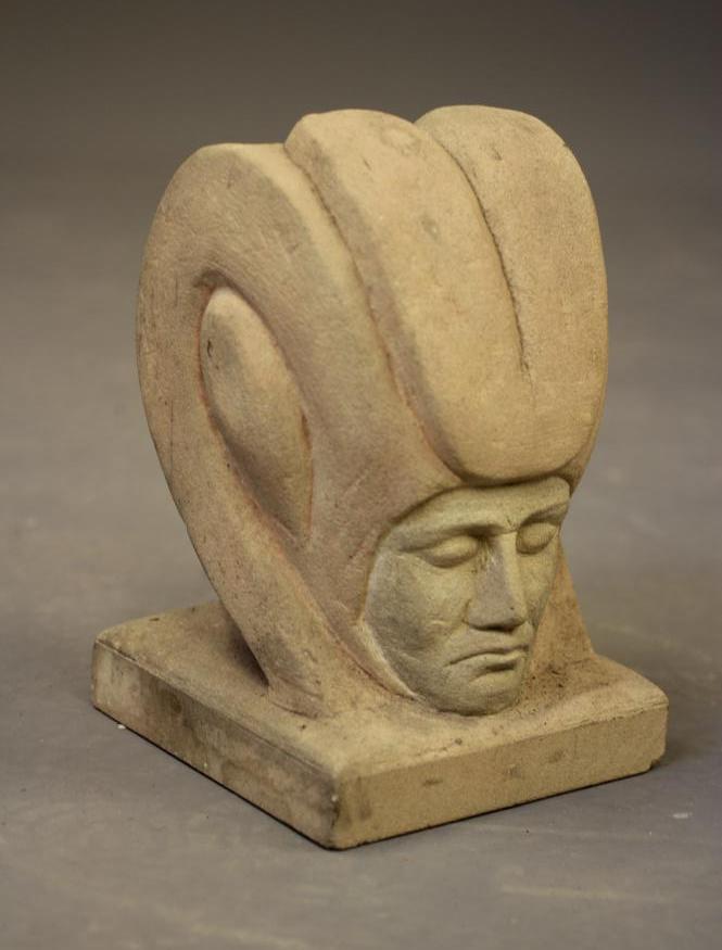 A carved sandstone male head (aztec(?)) | Hartleys Auctioneers & Valuers