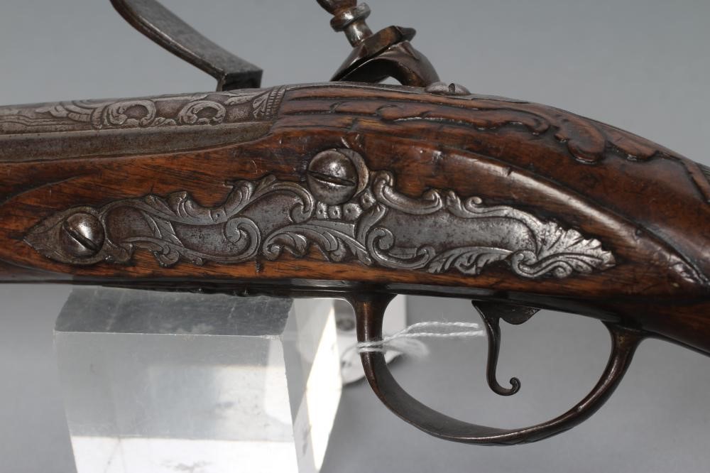 A matched pair of flintlock pistols | Hartleys Auctioneers & Valuers