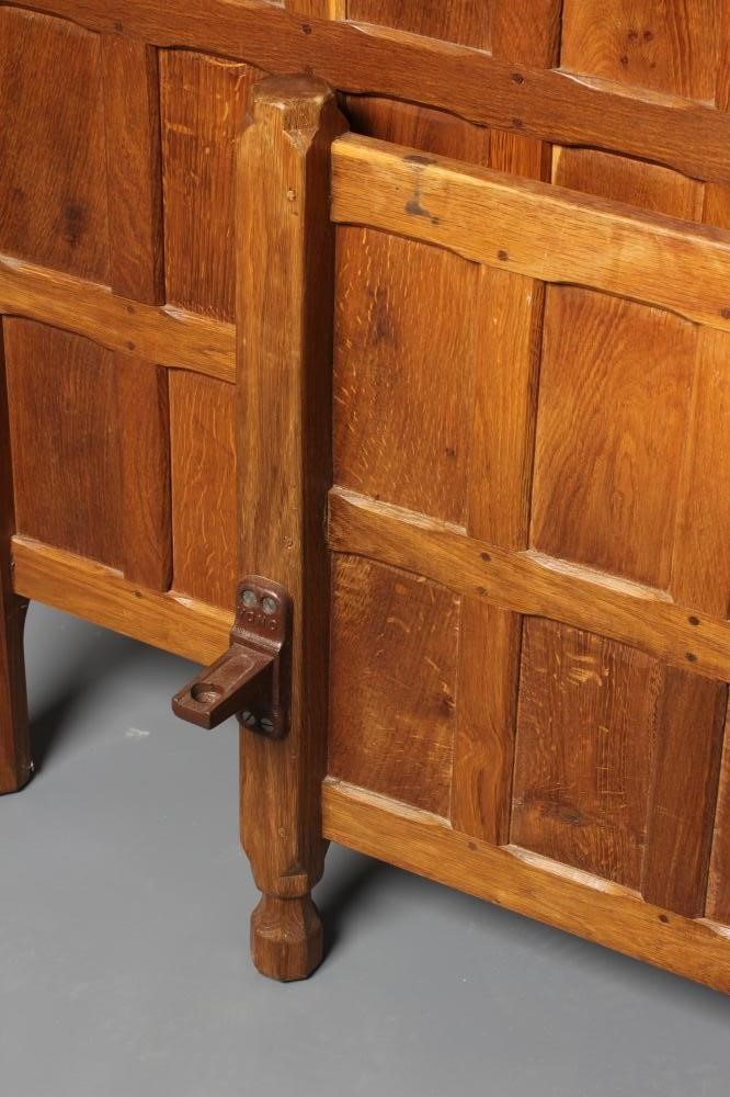 An adzed oak single bedstead | Hartleys Auctioneers & Valuers