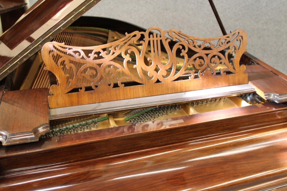 A lipp & sohn walnut boudoir grand piano | Hartleys Auctioneers & Valuers