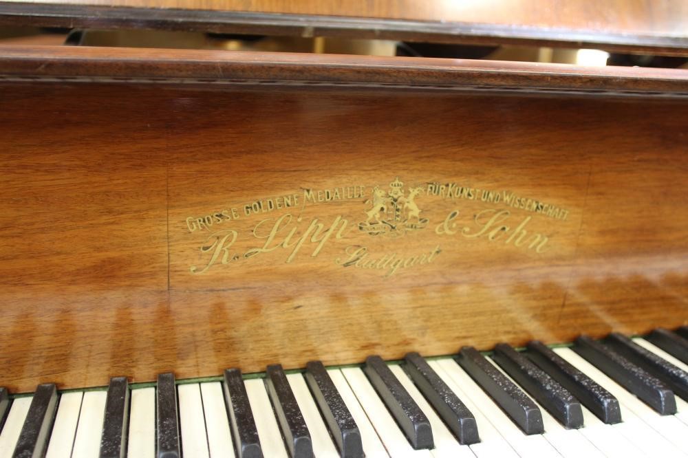 A lipp & sohn walnut boudoir grand piano | Hartleys Auctioneers & Valuers
