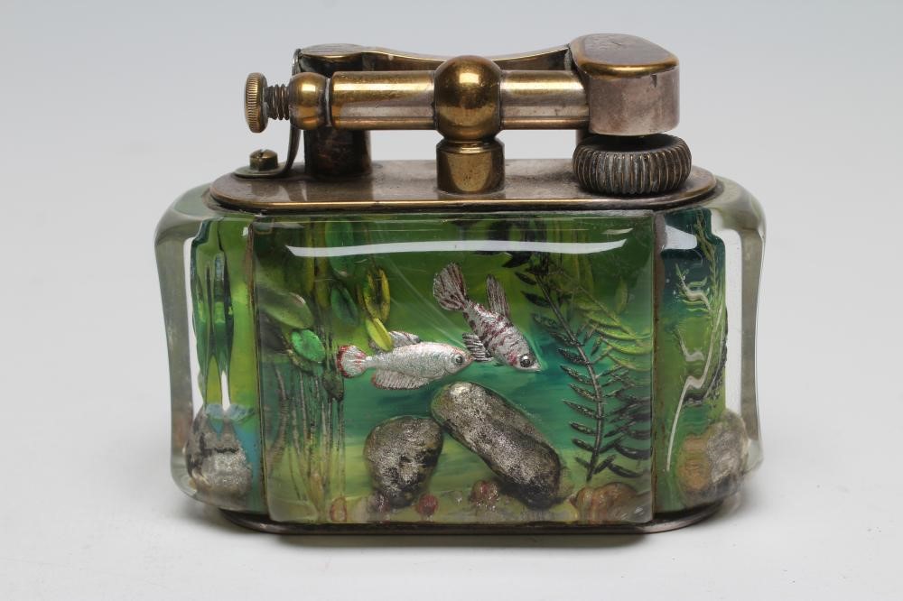 A dunhill lucite aquarium table lighter by margaret bennett Hartleys Auctioneers Valuers
