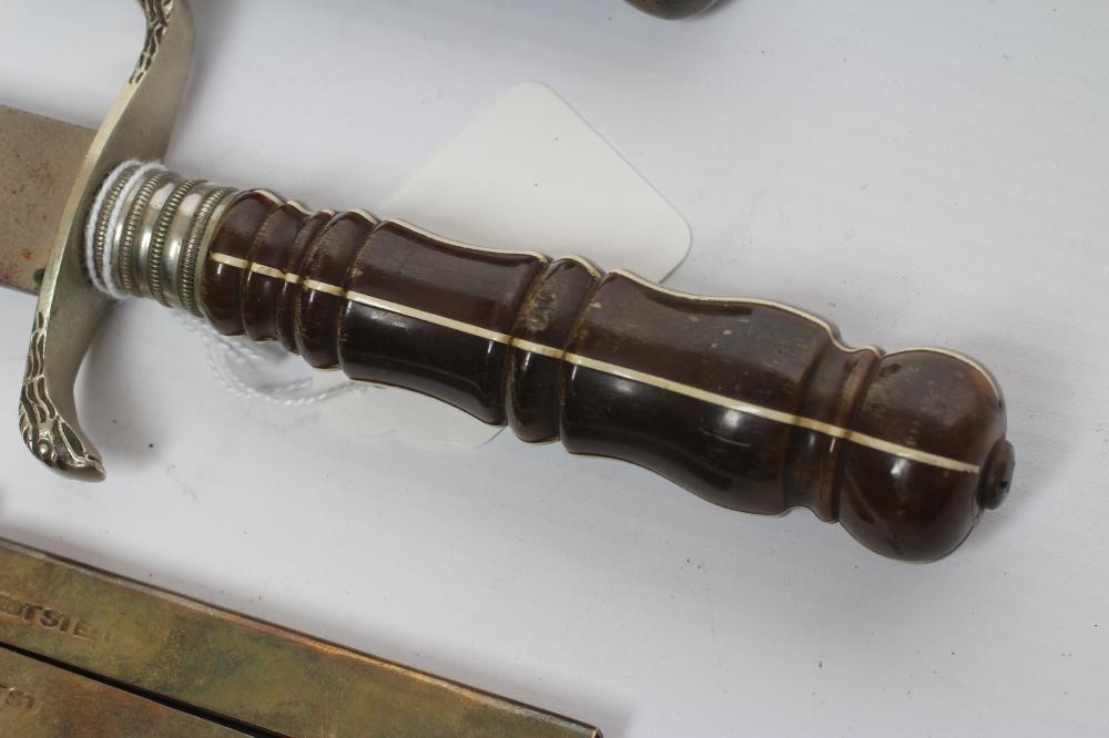 A collection of three daggers | Hartleys Auctioneers & Valuers