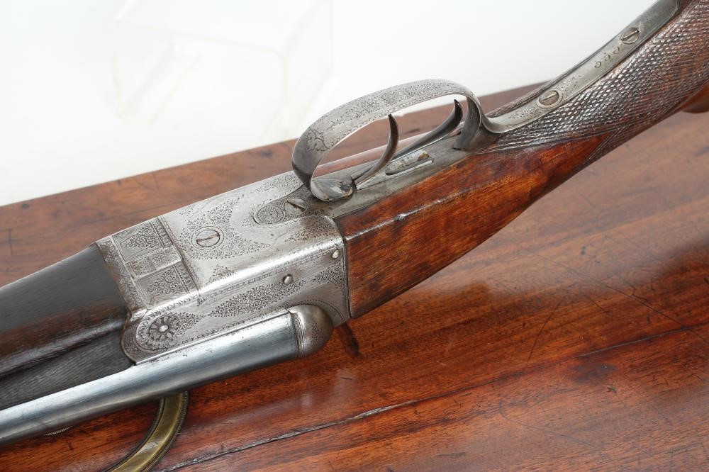 A hunter & sons side by side 12 bore shotgun converted from a large ...