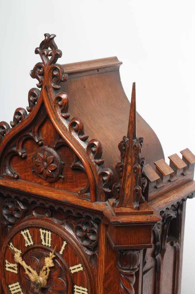 An oak cased cuckoo table clock | Hartleys Auctioneers & Valuers