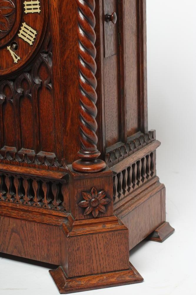 An oak cased cuckoo table clock | Hartleys Auctioneers & Valuers