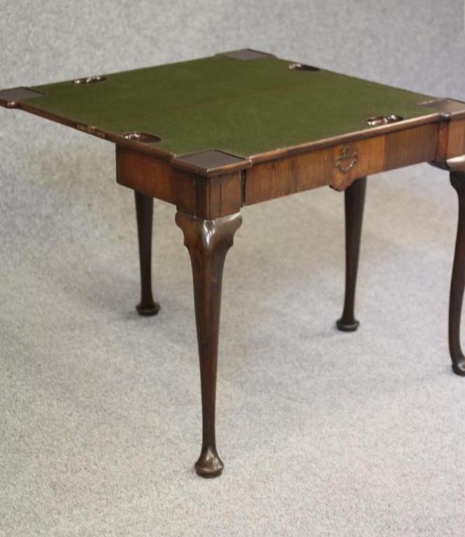 A george ii mahogany folding card table | Hartleys Auctioneers & Valuers