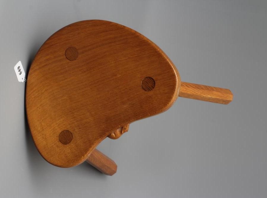 A robert thompson adzed oak cow stool | Hartleys Auctioneers & Valuers