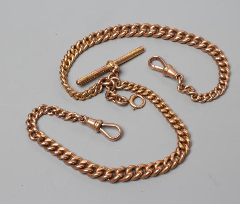 A 9ct gold graduated curb link double albert chain | Hartleys ...