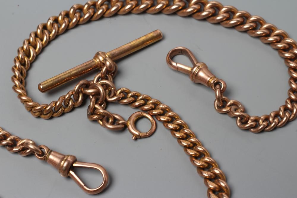 A 9ct gold graduated curb link double albert chain | Hartleys ...