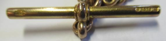 A 9ct gold graduated curb link double albert chain | Hartleys ...