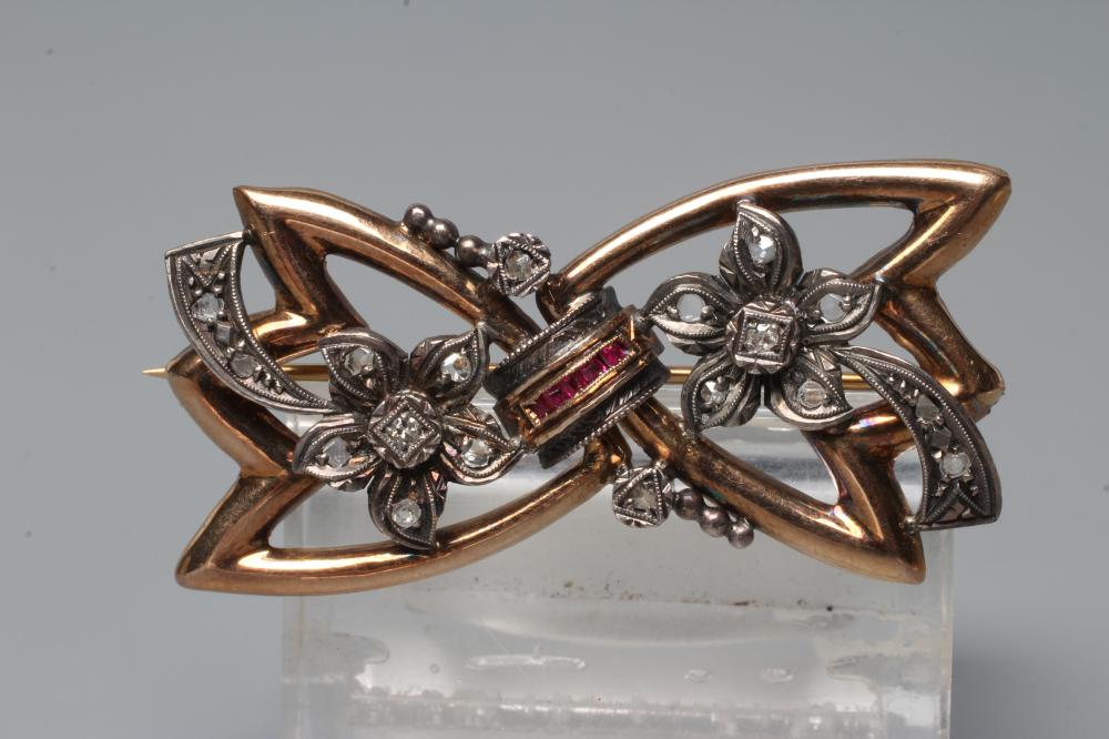 An art deco diamond and ruby bow brooch | Hartleys Auctioneers & Valuers