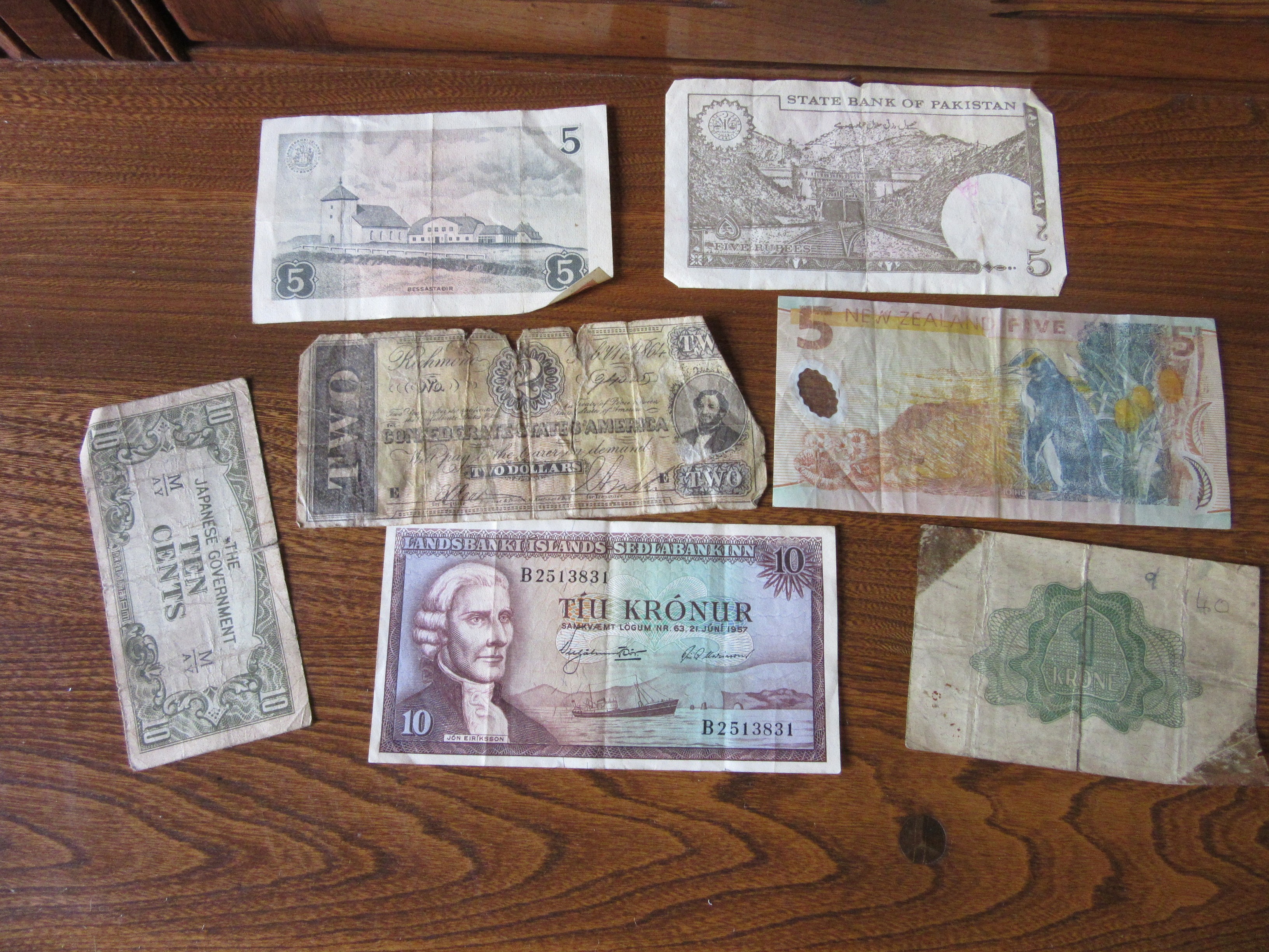 Envelope of banknotes including legal tender new zealand five dollar ...