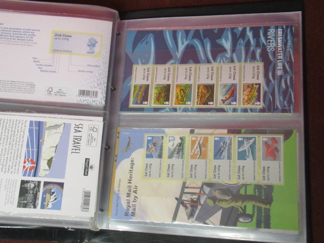 Twenty four mint decimal post and go first g class stamp booklets ...