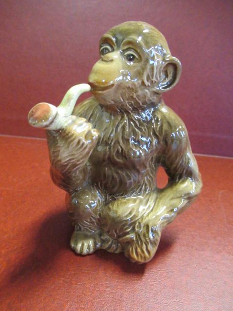 Beswick monkey smoking a pipe | Hartleys Auctioneers & Valuers
