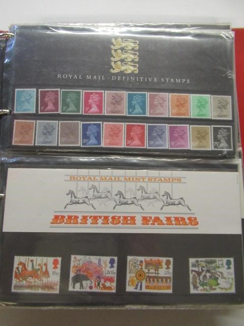 Red album of mint decimal presentation stamp booklets | Hartleys ...