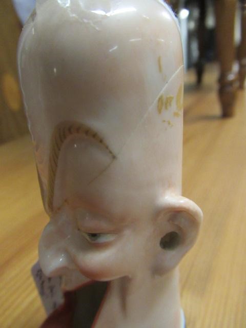 Novelty grenade porcelain hat pin holder and a similar pair of ashtrays ...