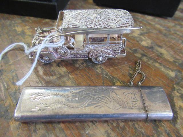 Silver filigree car and silver case | Hartleys Auctioneers & Valuers