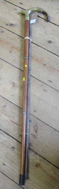 Walking cane and brass topped cane with glass vial | Hartleys ...