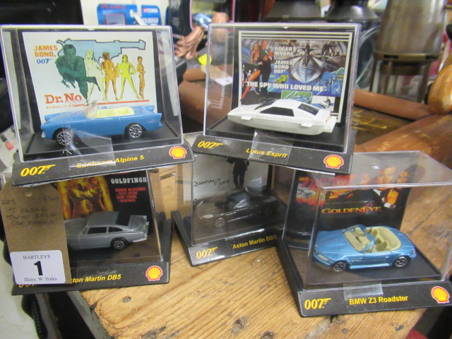 Five cased james bond car models | Hartleys Auctioneers & Valuers