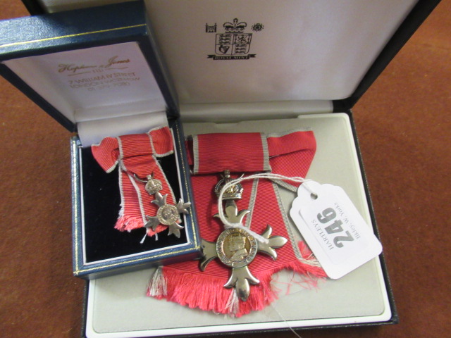 Cased silver mbe medal and miniature | Hartleys Auctioneers & Valuers