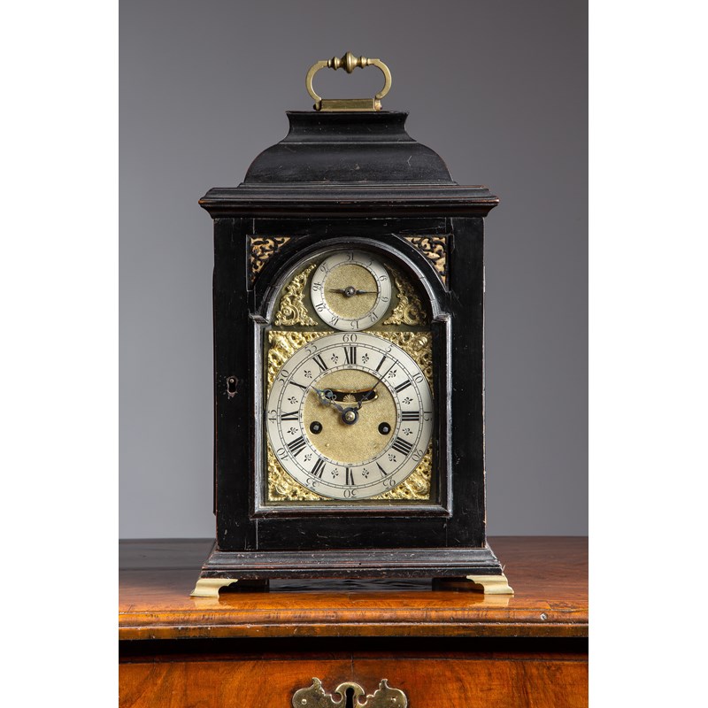An ebony table clock | Woolley and Wallis