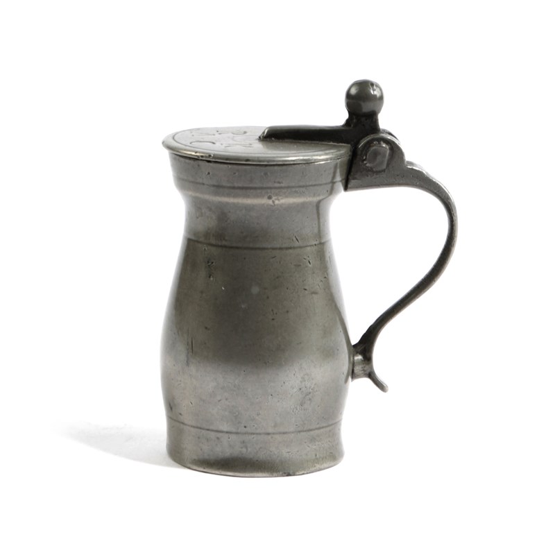 A scarce 'ball and bar' pewter baluster measure | Woolley and Wallis