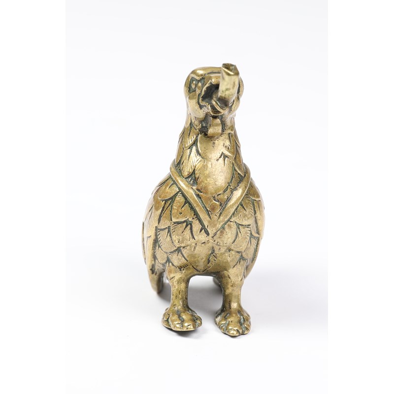A bronze oil lamp in the form of a cockerel | Woolley and Wallis