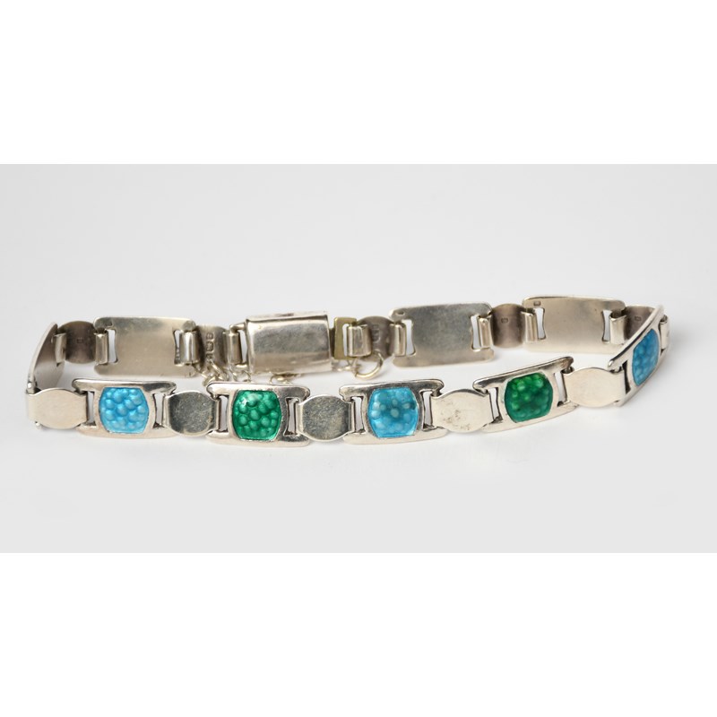 A james fenton silver and enamel bracelet, rectangular sections ...