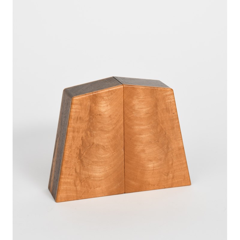 A pair of alan peters mahogany and satinwood book ends, shaped ...