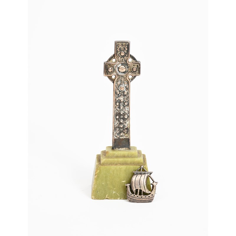 An iona silver celtic cross designed by alexander ritchie, on stepped ...